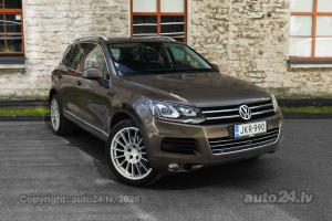 Brown Volkswagen Touareg 2011 in Tallinn, with an engine capacity of 4.20 L and mileage of 242 thousand km for 10999 €, photo 3 on AUTOMOTO.COM.LV