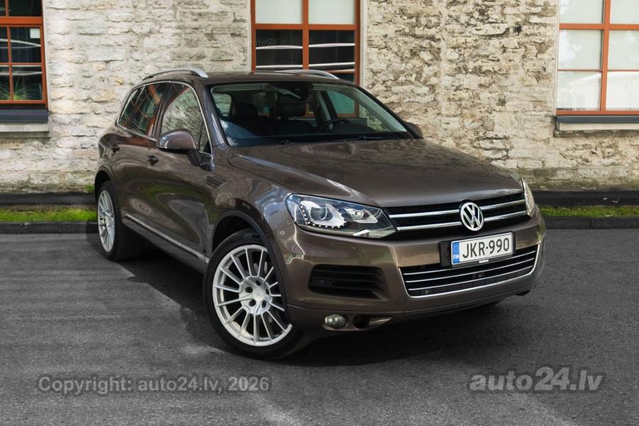Brown Volkswagen Touareg 2011 in Tallinn, with an engine capacity of 4.20 L and mileage of 242 thousand km for 10999 €, photo 3 on AUTOMOTO.COM.LV