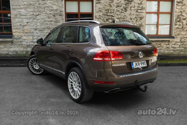 Brūns Volkswagen Touareg 2011 Tallina, ar dzinēja tilpumu 4.20 L un nobraukumu 242 tūkst. km par 10999 €, foto 4 vietnē AUTOMOTO.COM.LV
