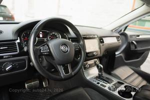 Brown Volkswagen Touareg 2011 in Tallinn, with an engine capacity of 4.20 L and mileage of 242 thousand km for 10999 €, photo 6 on AUTOMOTO.COM.LV