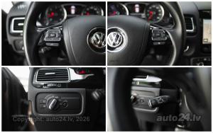 Brown Volkswagen Touareg 2011 in Tallinn, with an engine capacity of 4.20 L and mileage of 242 thousand km for 10999 €, photo 14 on AUTOMOTO.COM.LV