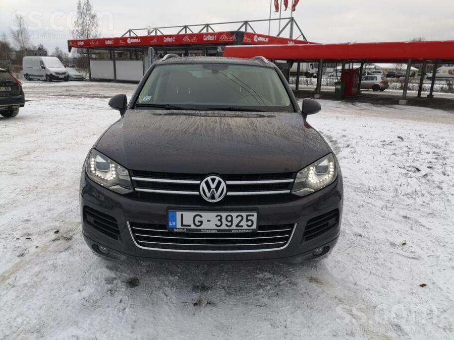 Brown Volkswagen Touareg 2012 in Riga, with an engine capacity of 3.00 L and mileage of 226 thousand km for 12600 €, photo 1 on AUTOMOTO.COM.LV