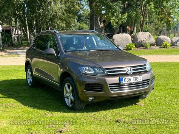Brown Volkswagen Touareg 2012 in Tartu, with an engine capacity of 3.00 L and mileage of 220 thousand km for 9990 €, photo 1 on AUTOMOTO.COM.LV