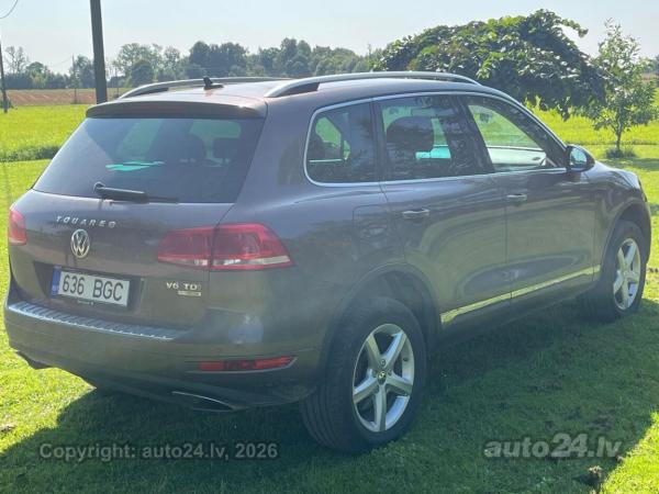 Brown Volkswagen Touareg 2012 in Tartu, with an engine capacity of 3.00 L and mileage of 220 thousand km for 9990 €, photo 6 on AUTOMOTO.COM.LV