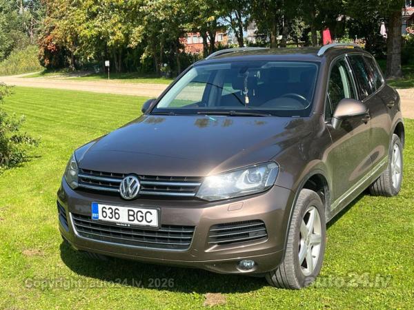 Brown Volkswagen Touareg 2012 in Tartu, with an engine capacity of 3.00 L and mileage of 220 thousand km for 9990 €, photo 7 on AUTOMOTO.COM.LV