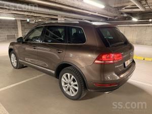 Brūns Volkswagen Touareg 2012 Valmiera, ar dzinēja tilpumu 3.00 L un nobraukumu 367 tūkst. km par 8700 €, foto 4 vietnē AUTOMOTO.COM.LV