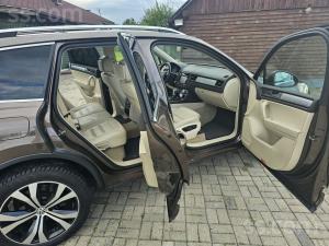 Brown Volkswagen Touareg 2012 in Riga, with an engine capacity of 3.00 L and mileage of 270 thousand km for 11289 €, photo 6 on AUTOMOTO.COM.LV