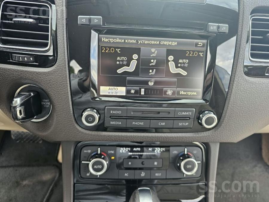 Brown Volkswagen Touareg 2012 in Riga, with an engine capacity of 3.00 L and mileage of 270 thousand km for 11289 €, photo 7 on AUTOMOTO.COM.LV