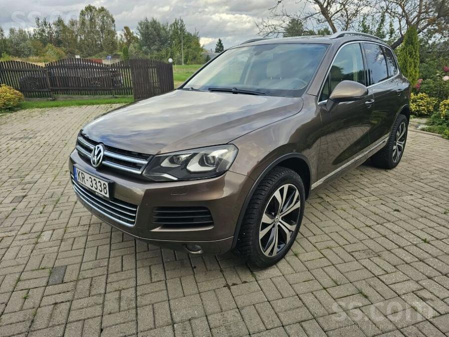 Brown Volkswagen Touareg 2012 in Riga, with an engine capacity of 3.00 L and mileage of 270 thousand km for 11289 €, photo 10 on AUTOMOTO.COM.LV