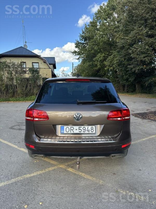 Brūns Volkswagen Touareg 2012 Rīga, ar dzinēja tilpumu 3.00 L un nobraukumu 302 tūkst. km par 10950 €, foto 5 vietnē AUTOMOTO.COM.LV