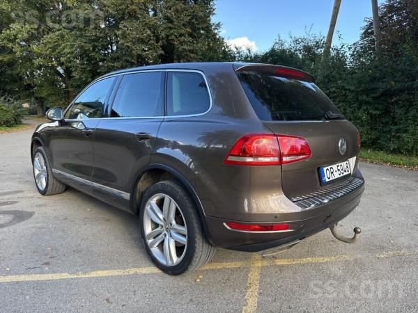 Brūns Volkswagen Touareg 2012 Rīga, ar dzinēja tilpumu 3.00 L un nobraukumu 302 tūkst. km par 10950 €, foto 6 vietnē AUTOMOTO.COM.LV