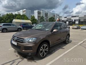 Brūns Volkswagen Touareg 2013 Rīga, ar dzinēja tilpumu 3.00 L un nobraukumu 190 tūkst. km par 12500 €, foto 1 vietnē AUTOMOTO.COM.LV