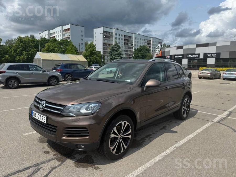 Brūns Volkswagen Touareg 2013 Rīga, ar dzinēja tilpumu 3.00 L un nobraukumu 190 tūkst. km par 12500 €, foto 1 vietnē AUTOMOTO.COM.LV