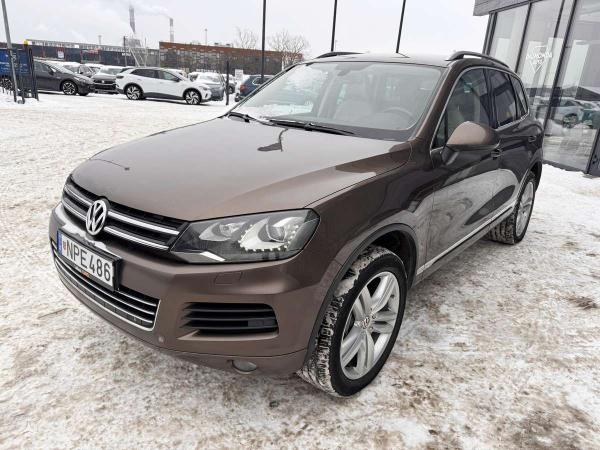 Brūns Volkswagen Touareg 2013 Kauņa, ar dzinēja tilpumu 2.97 L un nobraukumu 293 tūkst. km par 9500 €, foto 1 vietnē AUTOMOTO.COM.LV