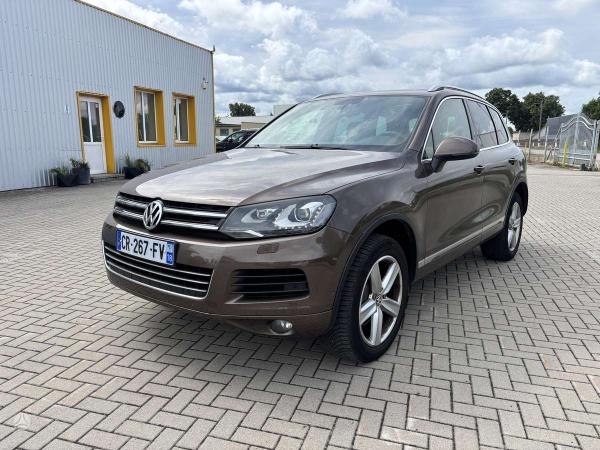 Brown Volkswagen Touareg 2013 in Taurage, with an engine capacity of 2.97 L and mileage of 256 thousand km for 11700 €, photo 3 on AUTOMOTO.COM.LV