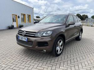 Brown Volkswagen Touareg 2013 in Taurage, with an engine capacity of 2.97 L and mileage of 256 thousand km for 11700 €, photo 4 on AUTOMOTO.COM.LV