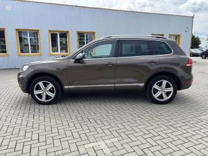 Brown Volkswagen Touareg 2013 in Taurage, with an engine capacity of 2.97 L and mileage of 256 thousand km for 11700 €, photo 5 on AUTOMOTO.COM.LV