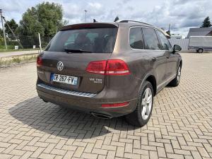 Brown Volkswagen Touareg 2013 in Taurage, with an engine capacity of 2.97 L and mileage of 256 thousand km for 11700 €, photo 6 on AUTOMOTO.COM.LV