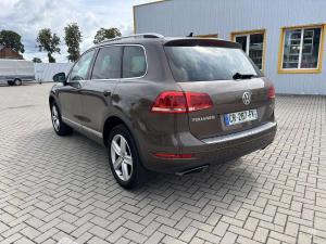 Brown Volkswagen Touareg 2013 in Taurage, with an engine capacity of 2.97 L and mileage of 256 thousand km for 11700 €, photo 8 on AUTOMOTO.COM.LV