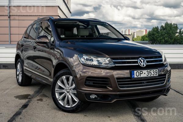 Brown Volkswagen Touareg 2014 in Riga, with an engine capacity of 3.00 L and mileage of 265 thousand km for 13990 €, photo 5 on AUTOMOTO.COM.LV