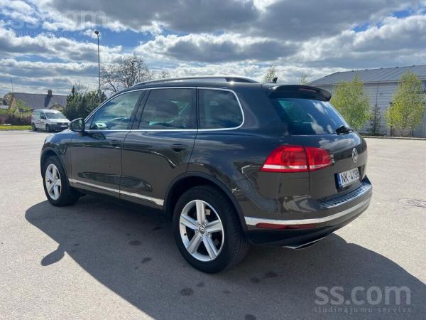 Brūns Volkswagen Touareg 2015 Tukums, ar dzinēja tilpumu 3.00 L un nobraukumu 172 tūkst. km par 18800 €, foto 4 vietnē AUTOMOTO.COM.LV