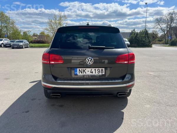Brūns Volkswagen Touareg 2015 Tukums, ar dzinēja tilpumu 3.00 L un nobraukumu 172 tūkst. km par 18800 €, foto 5 vietnē AUTOMOTO.COM.LV