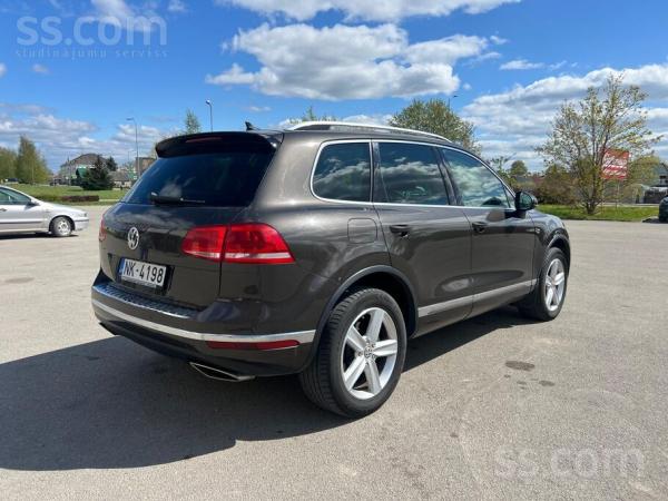 Brūns Volkswagen Touareg 2015 Tukums, ar dzinēja tilpumu 3.00 L un nobraukumu 172 tūkst. km par 18800 €, foto 6 vietnē AUTOMOTO.COM.LV