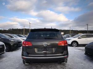 Brown Volkswagen Touareg 2015 in Vilnius, with an engine capacity of 3.00 L and mileage of 244 thousand km for 15450 €, photo 5 on AUTOMOTO.COM.LV