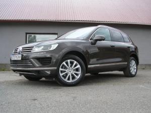 Brown Volkswagen Touareg 2015 in Sigulda, with an engine capacity of 3.00 L and mileage of 260 thousand km for 17350 €, photo  on AUTOMOTO.COM.LV
