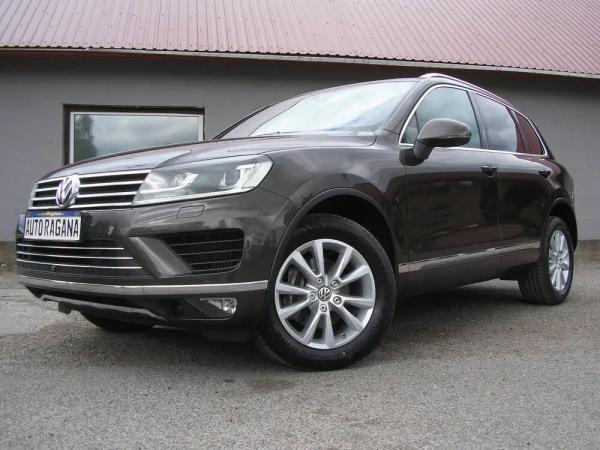 Brown Volkswagen Touareg 2015 in Sigulda, with an engine capacity of 3.00 L and mileage of 260 thousand km for 17350 €, photo 10 on AUTOMOTO.COM.LV