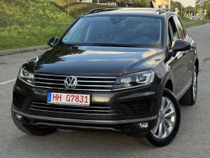 Brown Volkswagen Touareg 2015 in Jonava, with an engine capacity of 3.00 L and mileage of 275 thousand km for 15999 €, photo  on AUTOMOTO.COM.LV