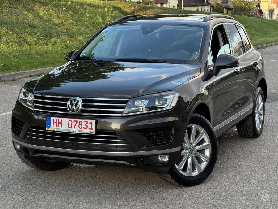 Brown Volkswagen Touareg 2015 in Jonava, with an engine capacity of 3.00 L and mileage of 275 thousand km for 15999 €, photo 3 on AUTOMOTO.COM.LV