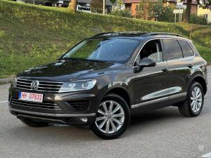 Brown Volkswagen Touareg 2015 in Jonava, with an engine capacity of 3.00 L and mileage of 275 thousand km for 15999 €, photo 4 on AUTOMOTO.COM.LV