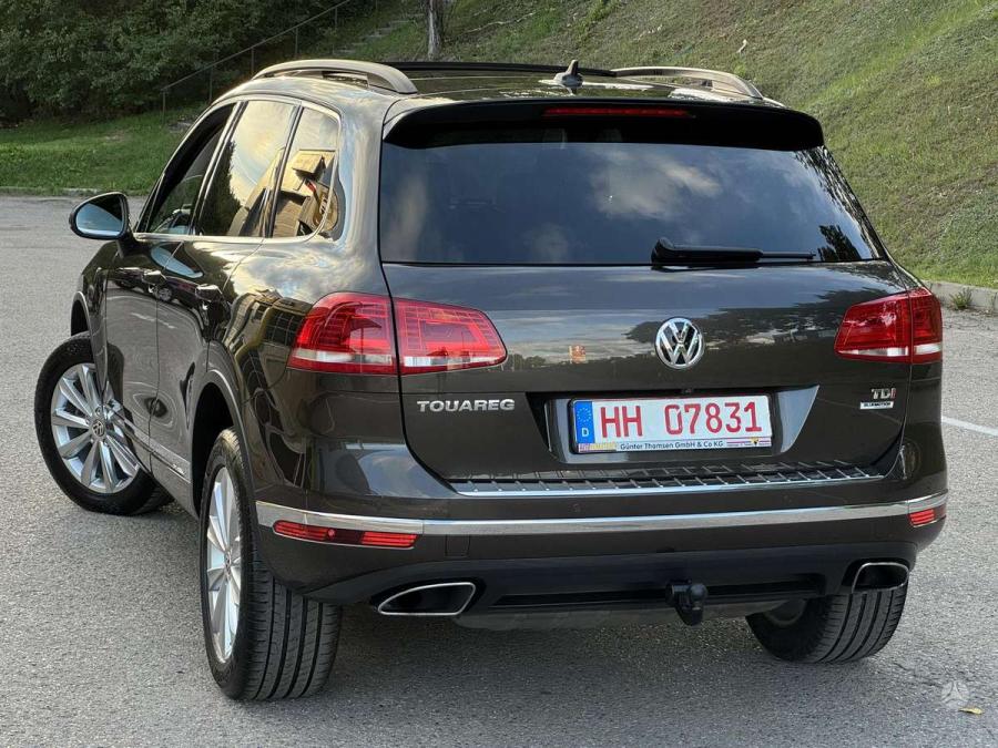 Brown Volkswagen Touareg 2015 in Jonava, with an engine capacity of 3.00 L and mileage of 275 thousand km for 15999 €, photo 8 on AUTOMOTO.COM.LV