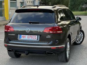 Brown Volkswagen Touareg 2015 in Jonava, with an engine capacity of 3.00 L and mileage of 275 thousand km for 15999 €, photo 10 on AUTOMOTO.COM.LV
