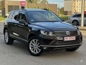 Brown Volkswagen Touareg 2015 in Jonava, with an engine capacity of 3.00 L and mileage of 275 thousand km for 15999 €, photo 14 on AUTOMOTO.COM.LV
