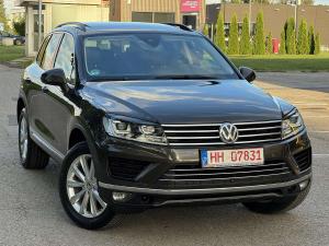 Brown Volkswagen Touareg 2015 in Jonava, with an engine capacity of 3.00 L and mileage of 275 thousand km for 15999 €, photo 15 on AUTOMOTO.COM.LV