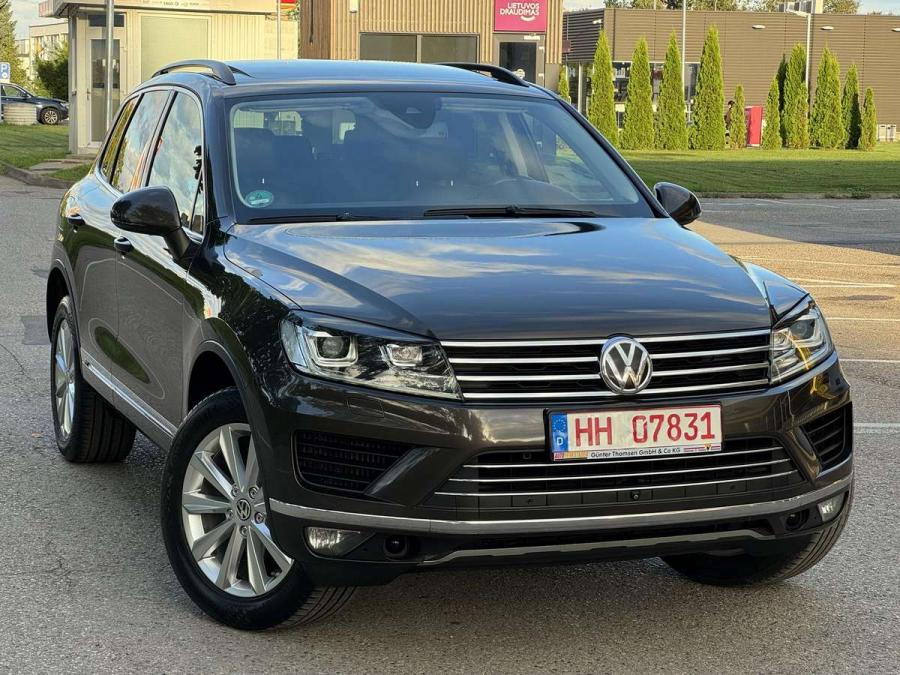 Brown Volkswagen Touareg 2015 in Jonava, with an engine capacity of 3.00 L and mileage of 275 thousand km for 15999 €, photo 15 on AUTOMOTO.COM.LV