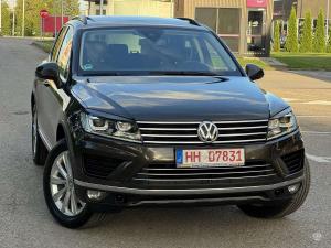 Brown Volkswagen Touareg 2015 in Jonava, with an engine capacity of 3.00 L and mileage of 275 thousand km for 15999 €, photo 16 on AUTOMOTO.COM.LV