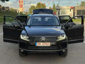 Brown Volkswagen Touareg 2015 in Jonava, with an engine capacity of 3.00 L and mileage of 275 thousand km for 15999 €, photo 21 on AUTOMOTO.COM.LV