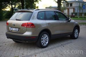 Brown Volkswagen Touareg 2016 in Riga, with an engine capacity of 3.00 L and mileage of 309 thousand km for 12790 €, photo 4 on AUTOMOTO.COM.LV