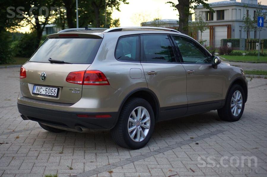Brown Volkswagen Touareg 2016 in Riga, with an engine capacity of 3.00 L and mileage of 309 thousand km for 12790 €, photo 4 on AUTOMOTO.COM.LV