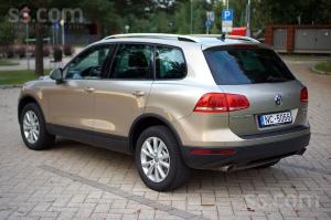 Brown Volkswagen Touareg 2016 in Riga, with an engine capacity of 3.00 L and mileage of 309 thousand km for 12790 €, photo 6 on AUTOMOTO.COM.LV