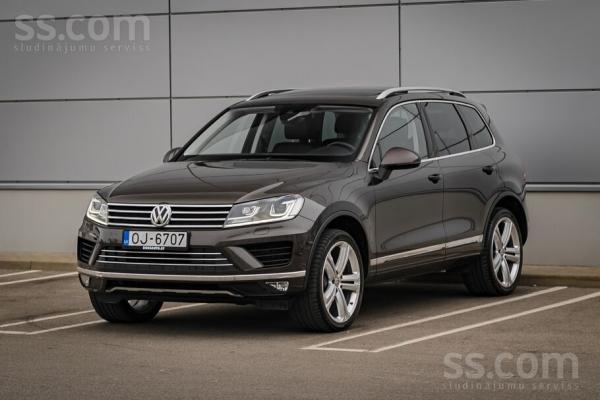 Brown Volkswagen Touareg 2016 in Riga, with an engine capacity of 3.00 L and mileage of 214 thousand km for 15750 €, photo 1 on AUTOMOTO.COM.LV