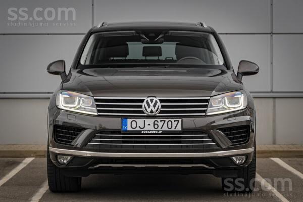 Brown Volkswagen Touareg 2016 in Riga, with an engine capacity of 3.00 L and mileage of 214 thousand km for 15750 €, photo 2 on AUTOMOTO.COM.LV