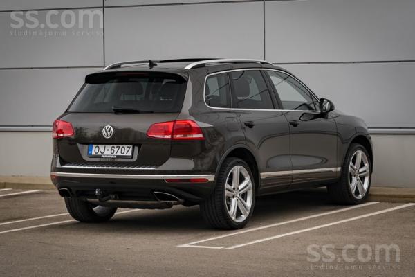 Brown Volkswagen Touareg 2016 in Riga, with an engine capacity of 3.00 L and mileage of 214 thousand km for 15750 €, photo 4 on AUTOMOTO.COM.LV