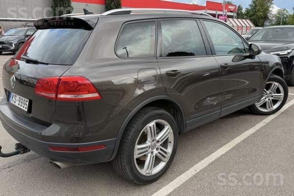 Brūns Volkswagen Touareg 2016 Rīga, ar dzinēja tilpumu 3.00 L un nobraukumu 266 tūkst. km par 14500 €, foto 8 vietnē AUTOMOTO.COM.LV