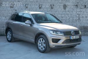 Brown Volkswagen Touareg 2017 in Liepaja, with an engine capacity of 3.00 L and mileage of 343 thousand km for 13650 €, photo  on AUTOMOTO.COM.LV