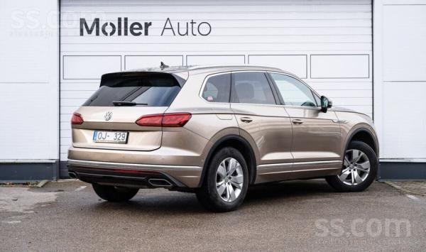 Brown Volkswagen Touareg 2018 in Riga, with an engine capacity of 3.00 L and mileage of 194 thousand km for 33950 €, photo 3 on AUTOMOTO.COM.LV
