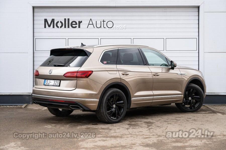 Brown Volkswagen Touareg 2018 in Riga, with an engine capacity of 3.00 L and mileage of 194 thousand km for 31500 €, photo 3 on AUTOMOTO.COM.LV